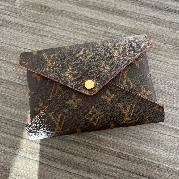 Louis Vuitton | Bags | Louis Vuitton Kirigami Pochette Clutchwallet ...